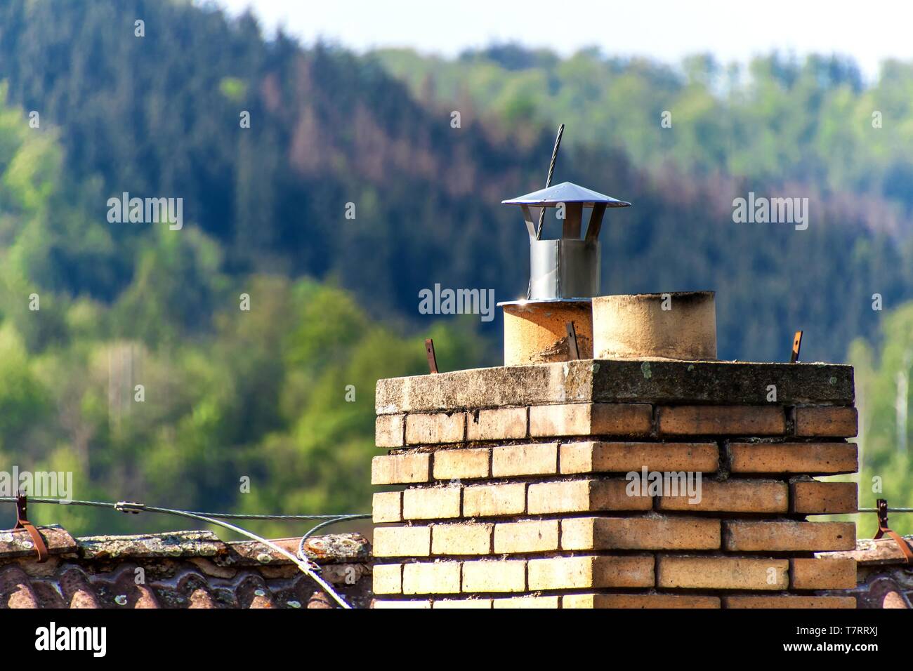 Old brick chimney. Ecology concept. Heating with coal. Ecological ...