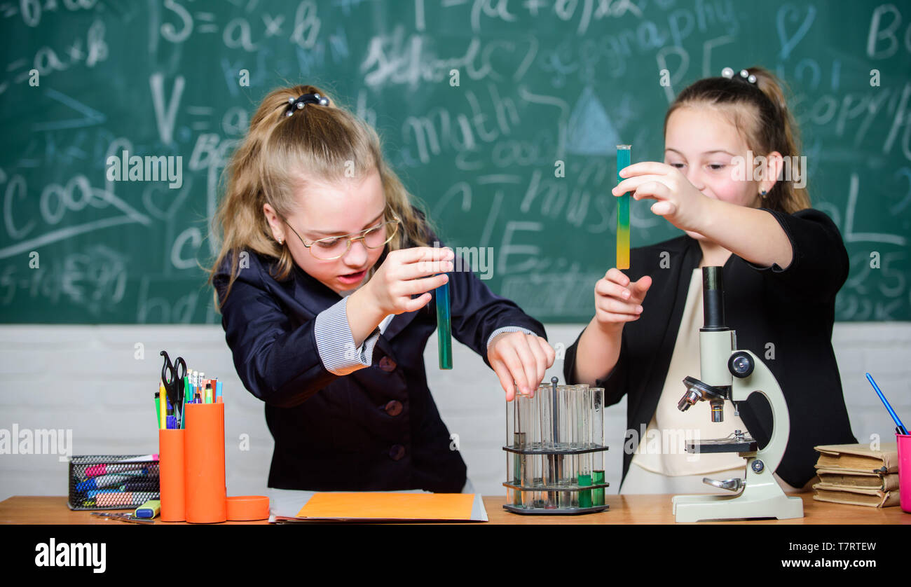 Girls school uniform excited proving their hypothesis. Gymnasium ...