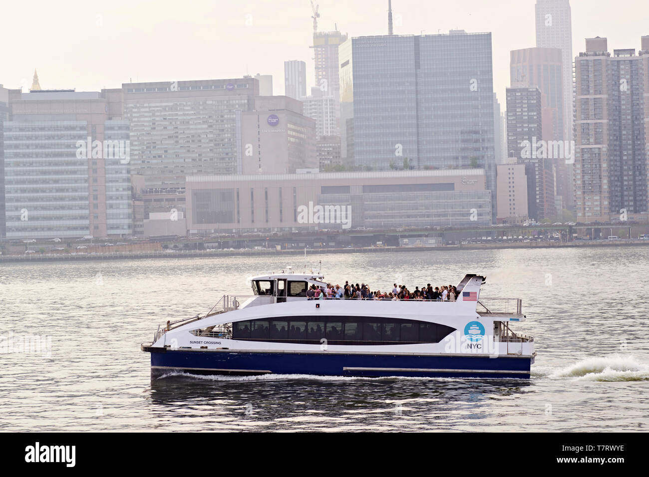 East River Ferry Cruising By The Gantry State Park In Long Island City