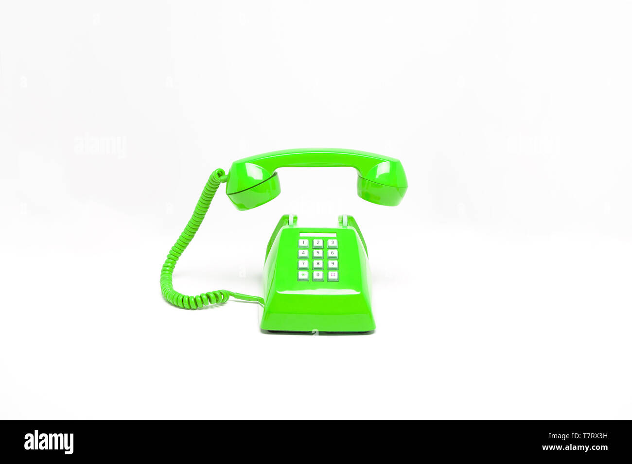 Green classic telephone on white background, phone ringing, phone ...