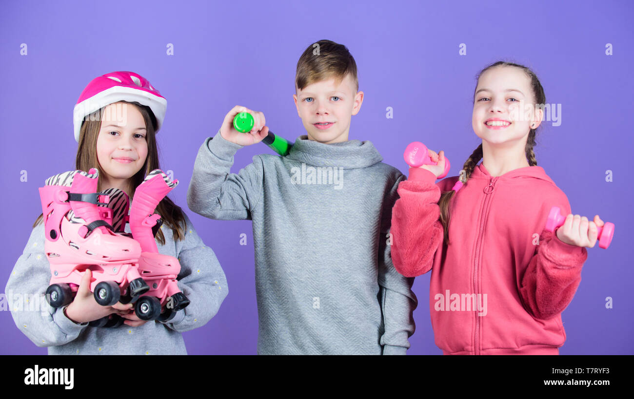 Join active lifestyle. Kids girls and boy with roller skates dumbbells ...