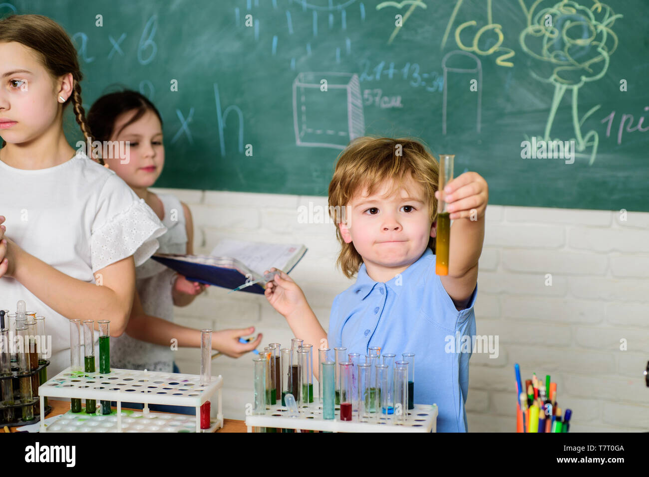 Chemistry themed club. School club education. Teacher and pupils test ...