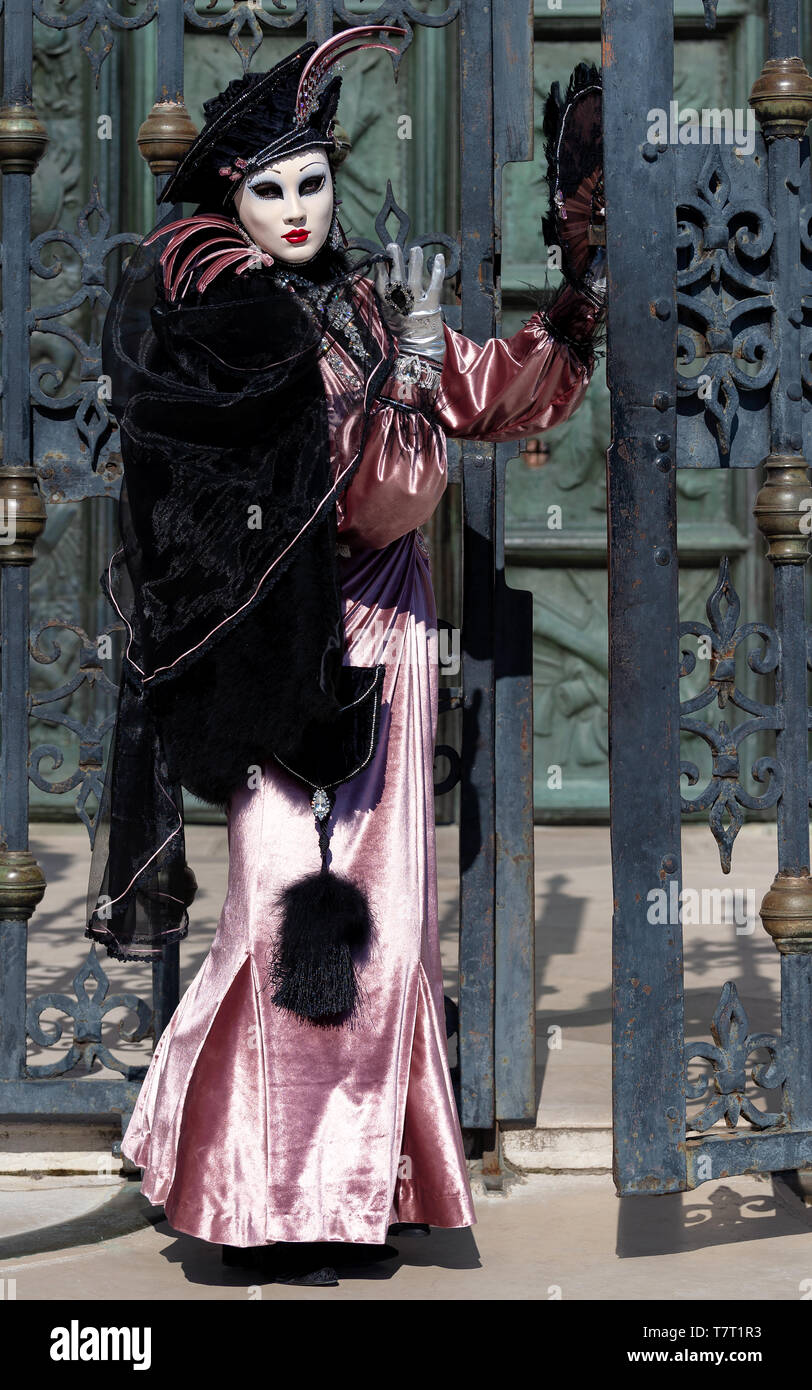 Reveller In Traditional Elaborate Mask And Costume At Venice Carnival ...