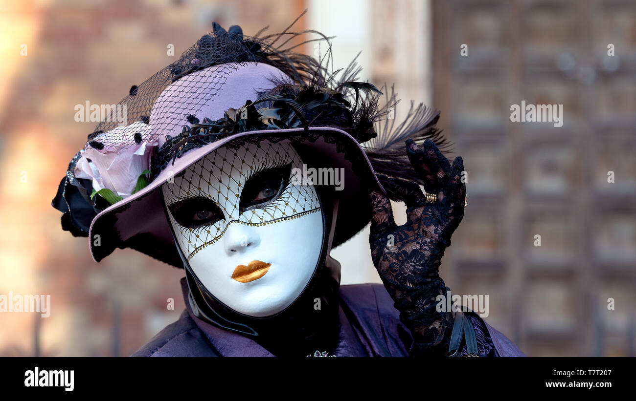 Reveller In Traditional Elaborate Mask And Costume At Venice Carnival ...