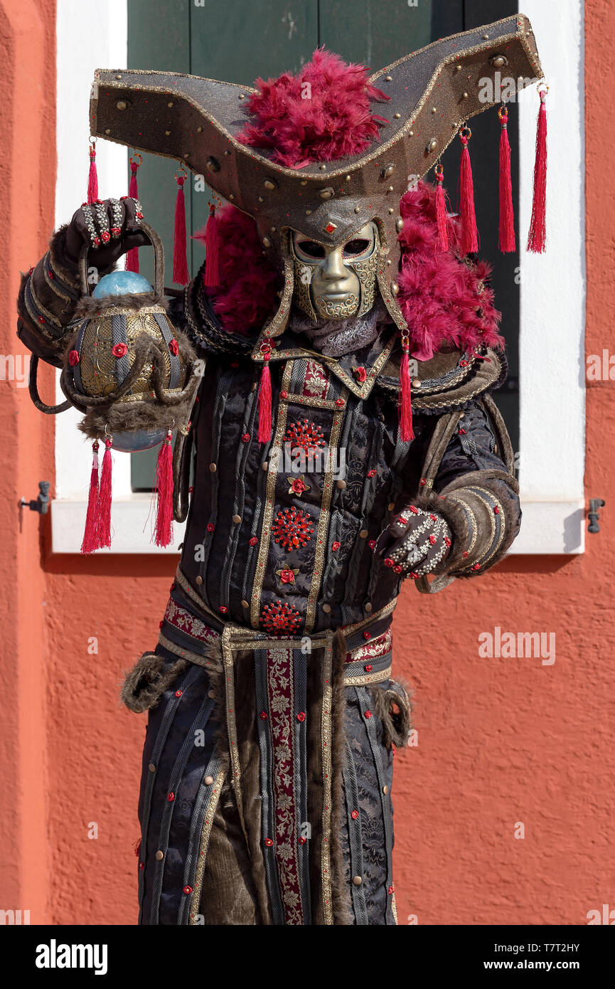 Reveller In Traditional Elaborate Mask And Costume On Burano As Part Of ...