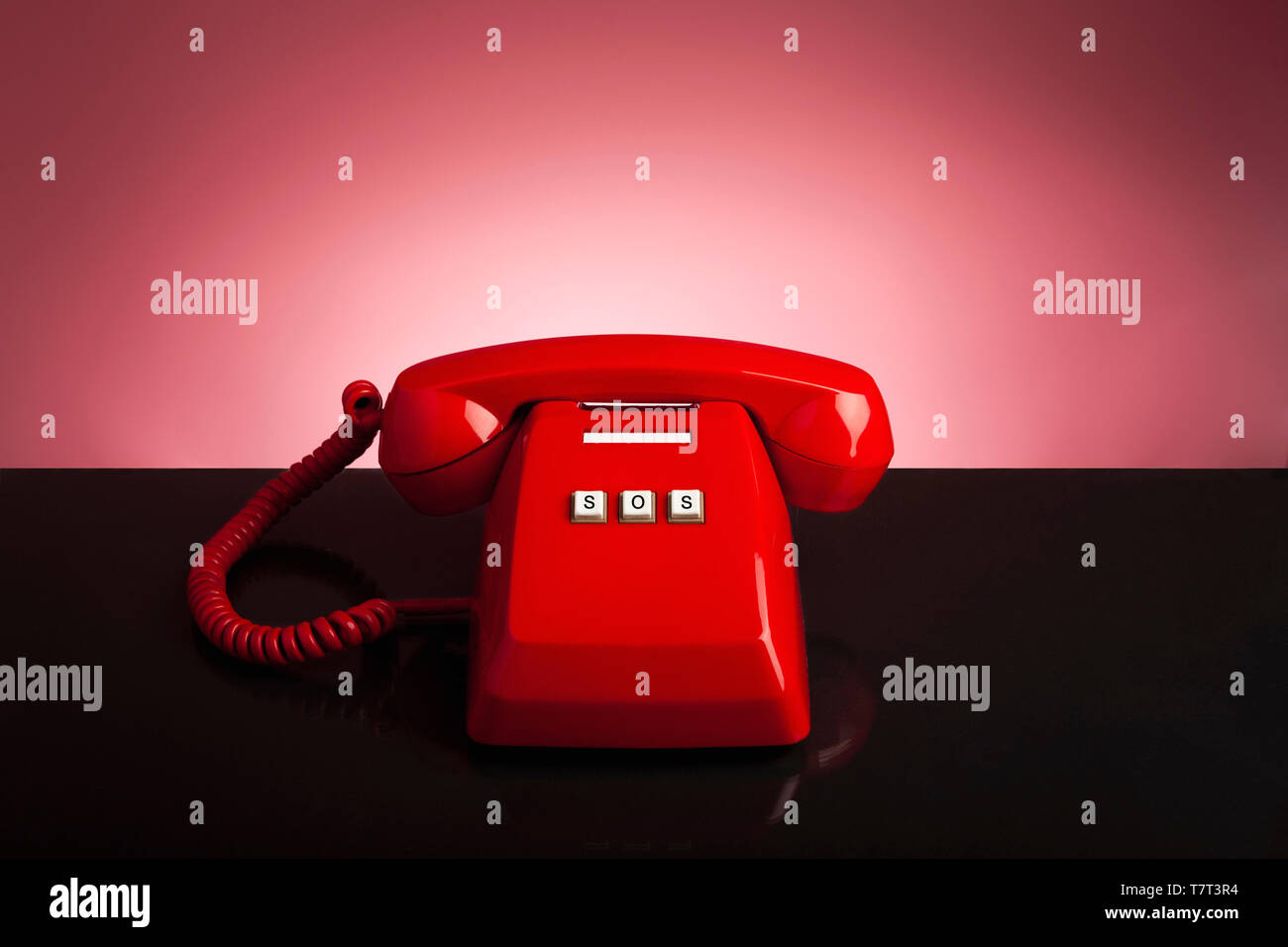 Emergency call 911 on the telephone, red old vintage telephone on black ...