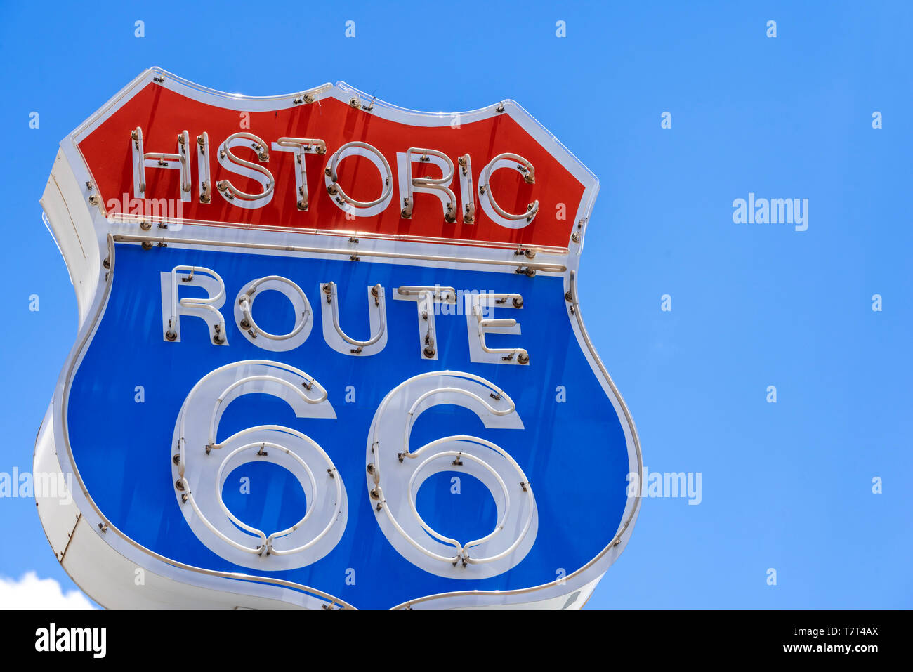 Red, white and blue vintage neon sign on the famous, historic Route 66 ...