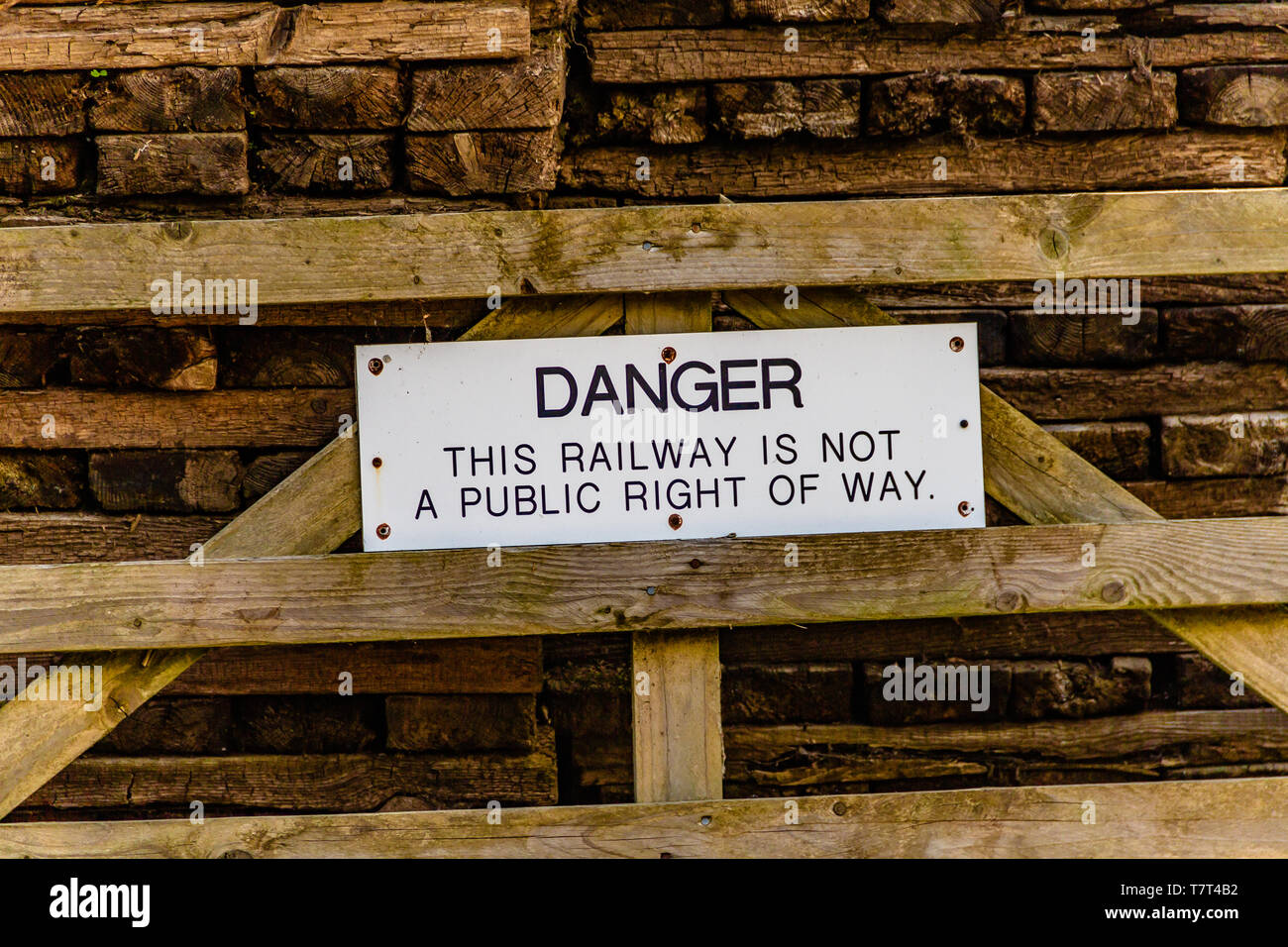 Danger sign by a railway line, UK. June 2018 Stock Photo - Alamy