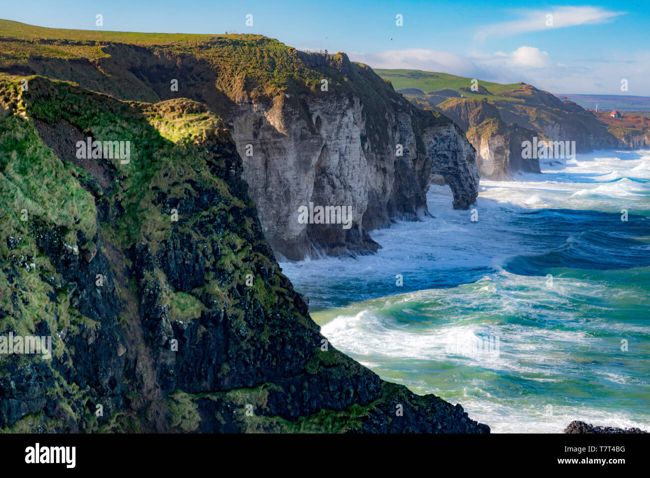 View of sea arch from Dunlace Castle, County Antrim, Northern Ireland ...