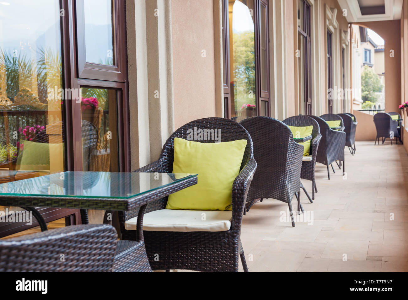 The veranda,street view of a outdoor coffee terrace with tables and ...