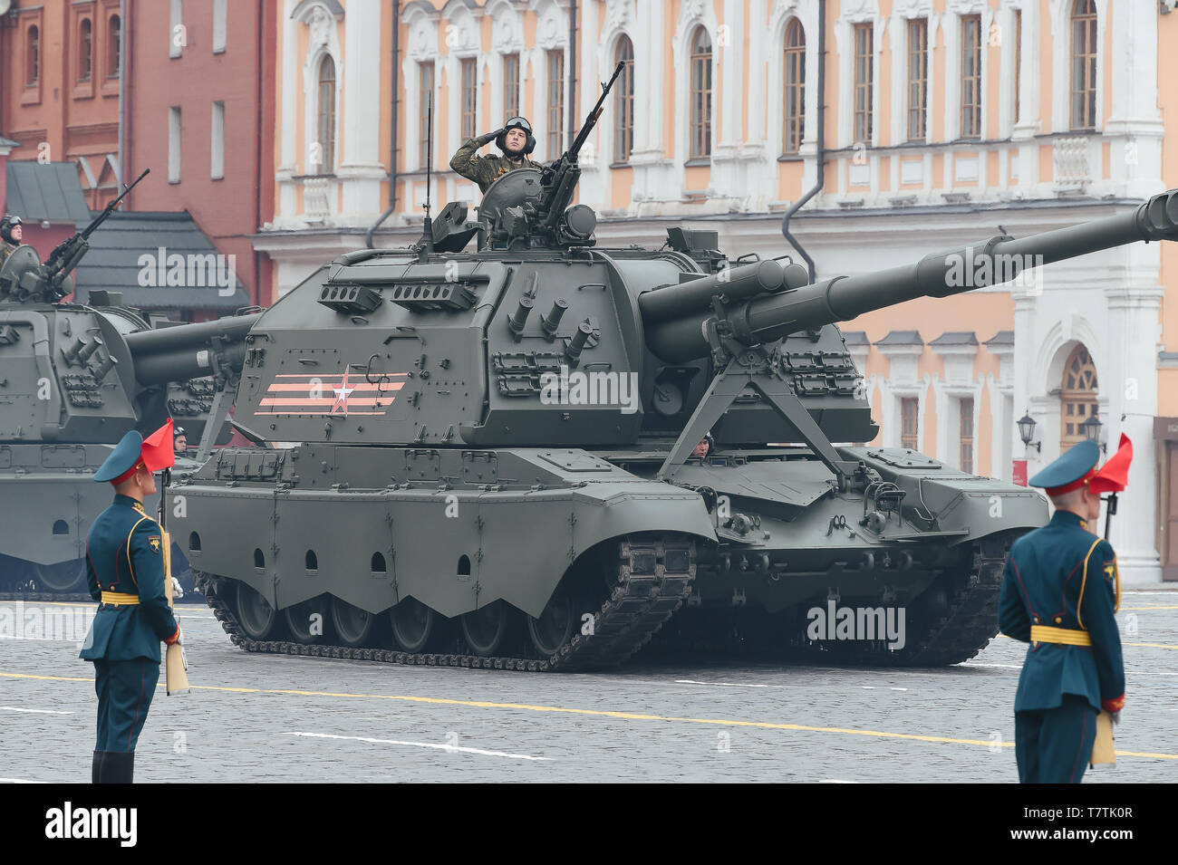 Moscow, Russia. 9th May, 2019. Soldiers salute as they drive by on the ...