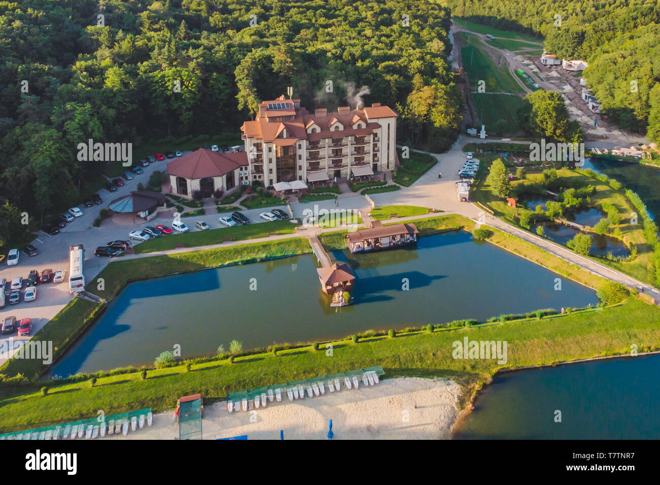 aerial view of resort near lake forest around Stock Photo - Alamy
