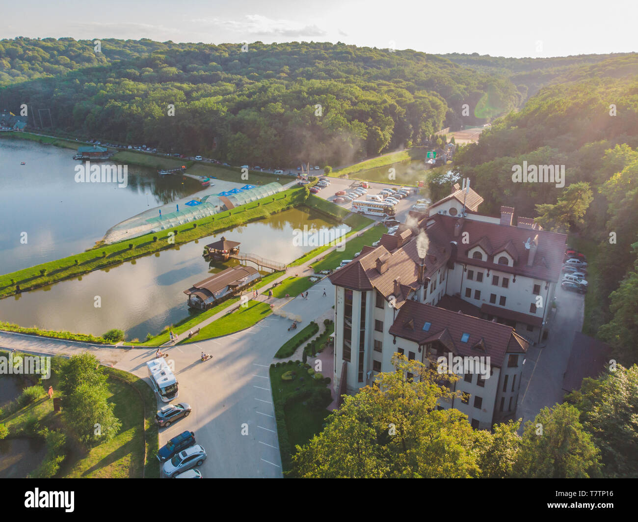 aerial view of resort near lake forest around Stock Photo - Alamy