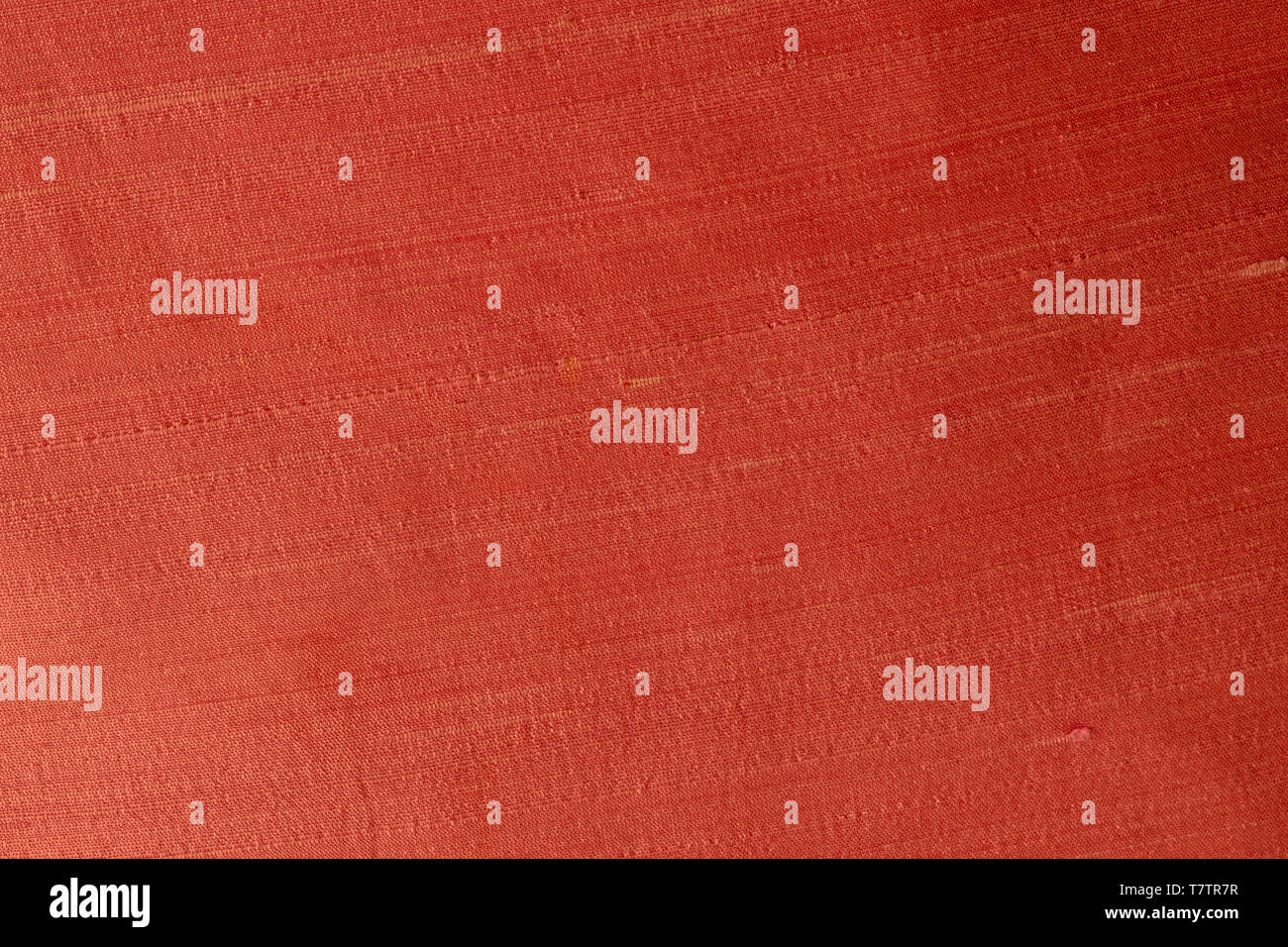 Close up of the woolen fabric of red-orange pantone color. Abstract ...