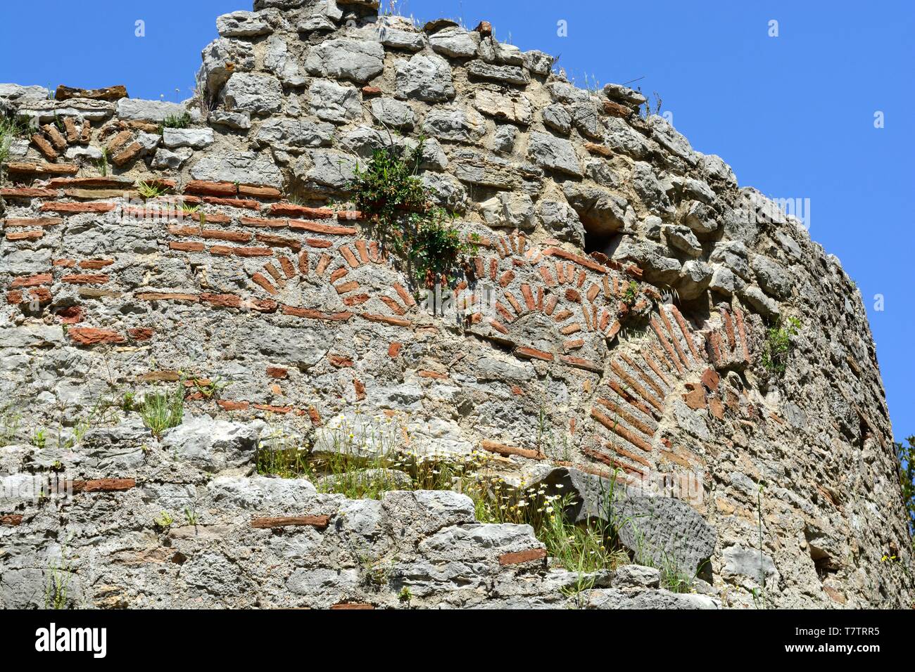Roman red brick pattern on a wall at Butrint Archaeological site ...