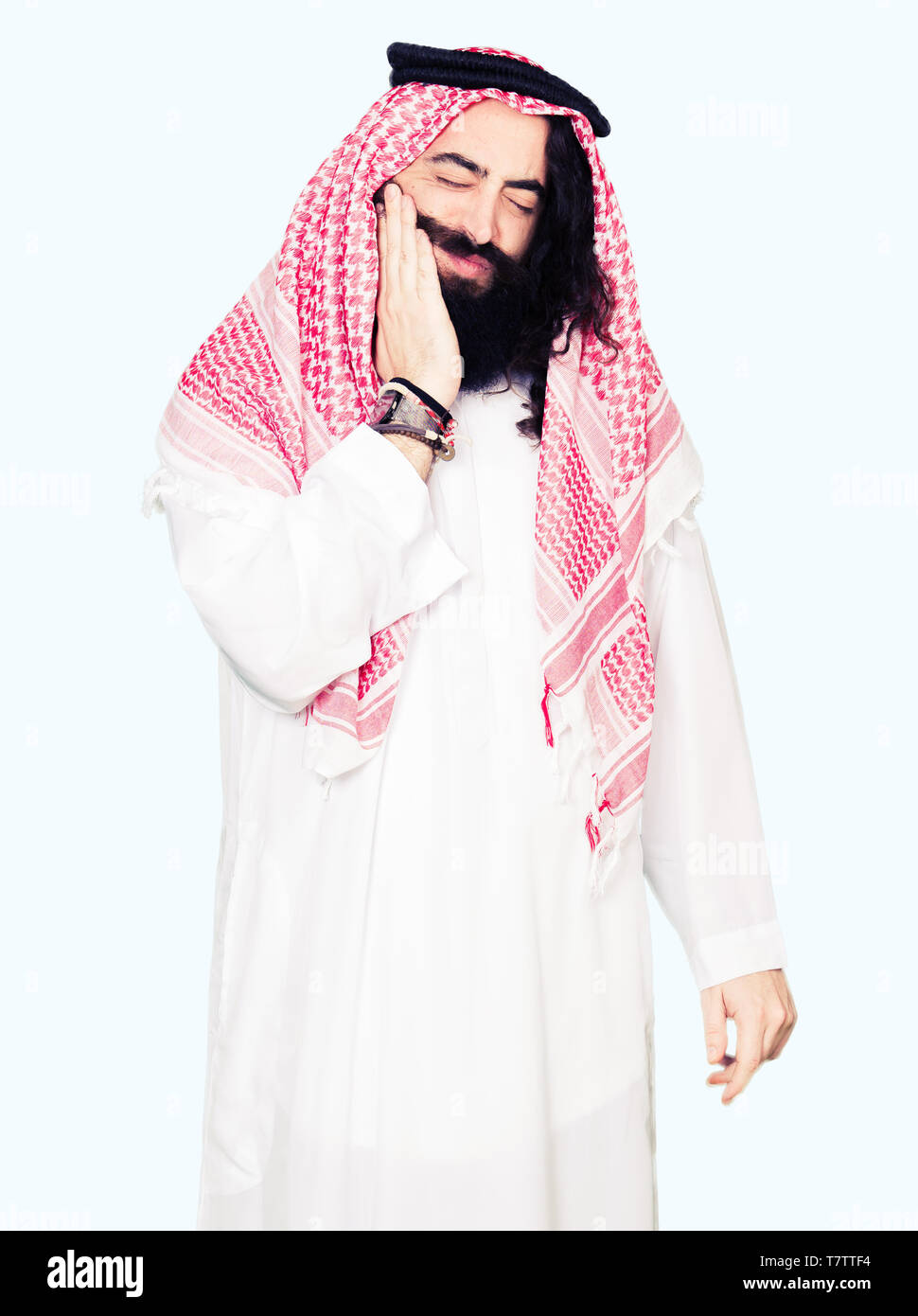 Arabian business man with long hair wearing traditional keffiyeh scarf ...