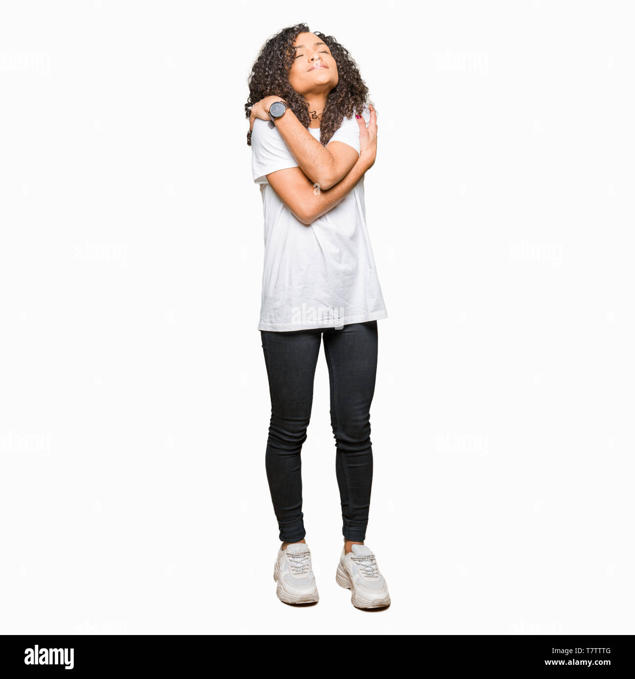 Teenager hugging white background Cut Out Stock Images & Pictures - Alamy