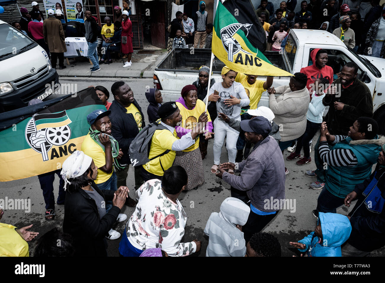 An ANC marshall carries the party's flag at a 2019 South African ...