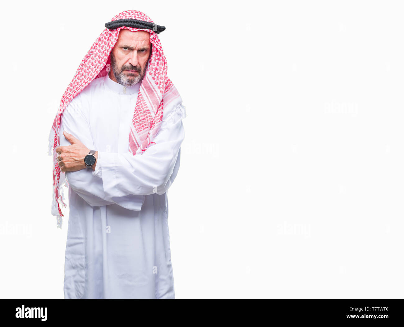 Senior arab man wearing keffiyeh over isolated background skeptic and ...