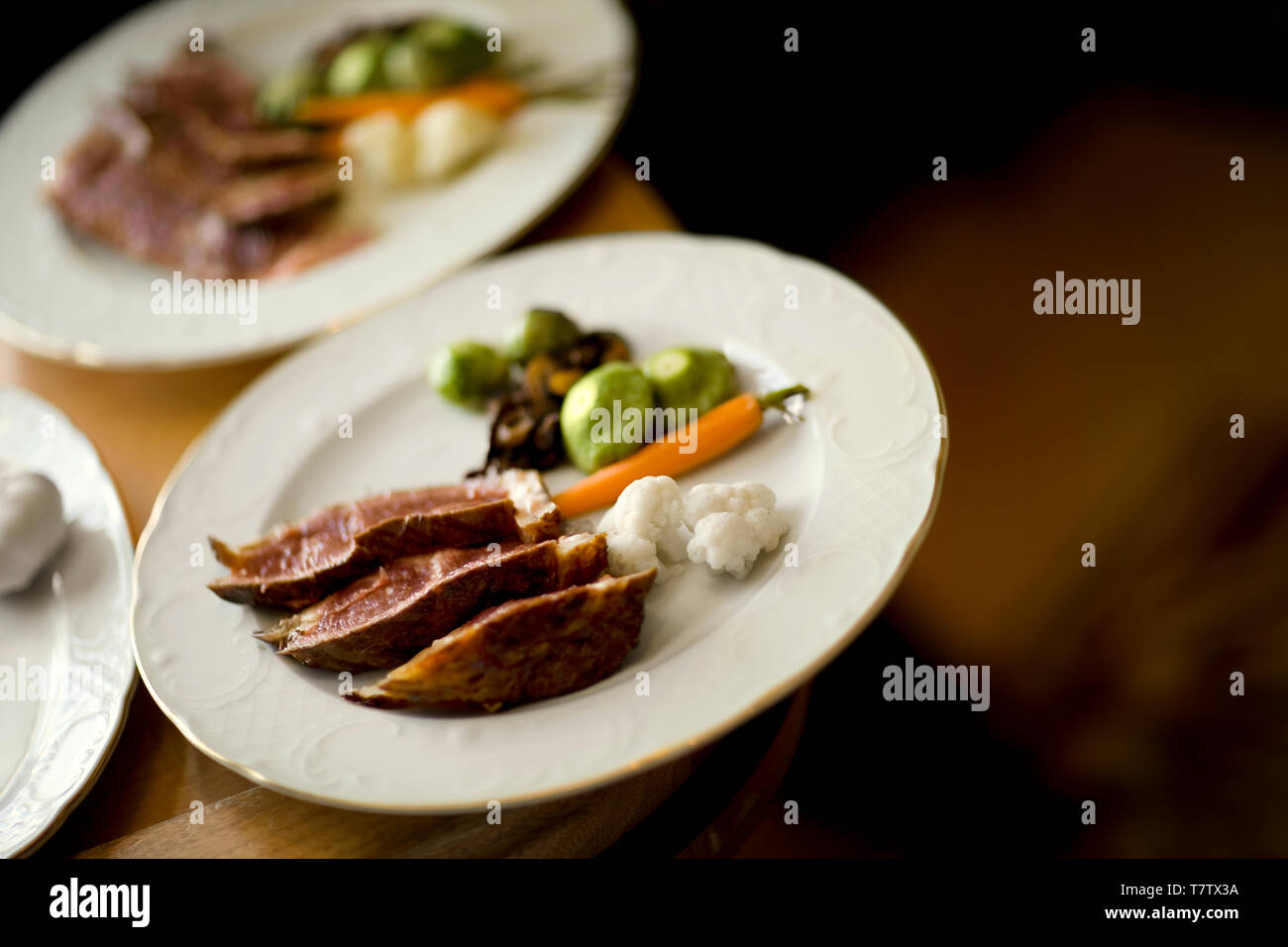 Gourmet beef based dish served at a luxury restaurant Stock Photo - Alamy