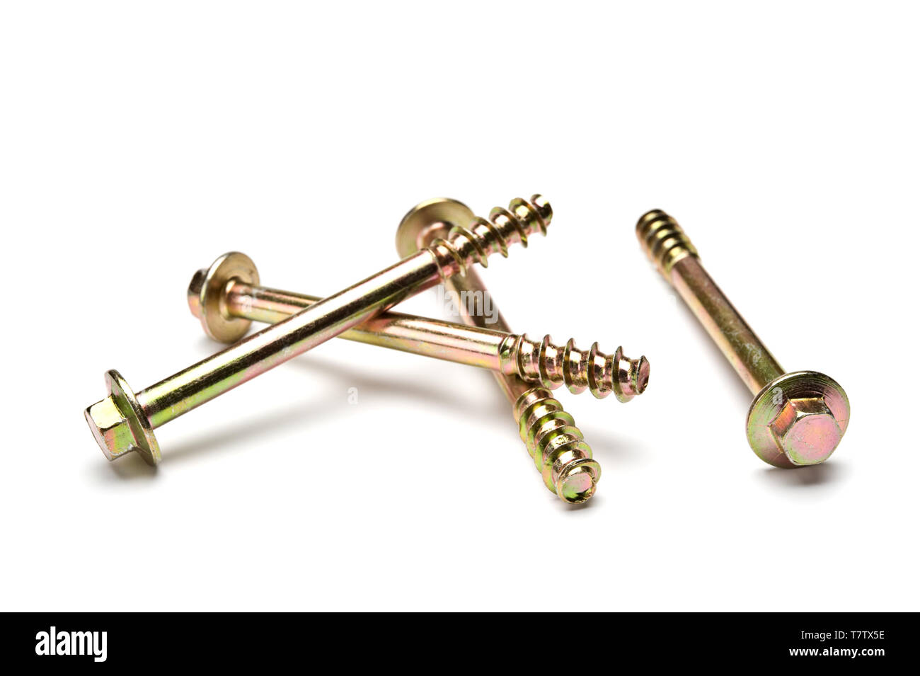 Screws on white background. Focus on foreground Stock Photo - Alamy