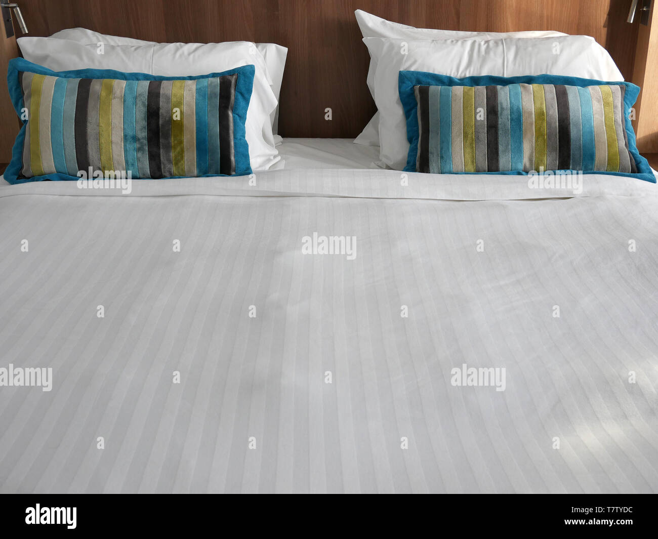 Interior frontal view double bed luxury modern bedroom Stock Photo - Alamy