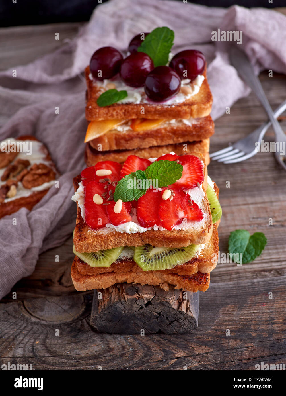 pile of French toast from white bread with cottage cheese, strawberries ...