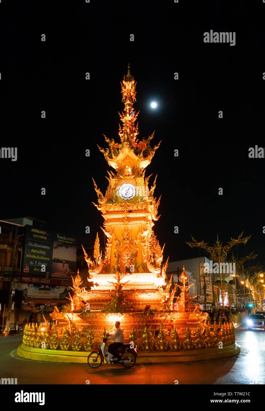 Clock tower orange illuminated in the night hi-res stock photography ...