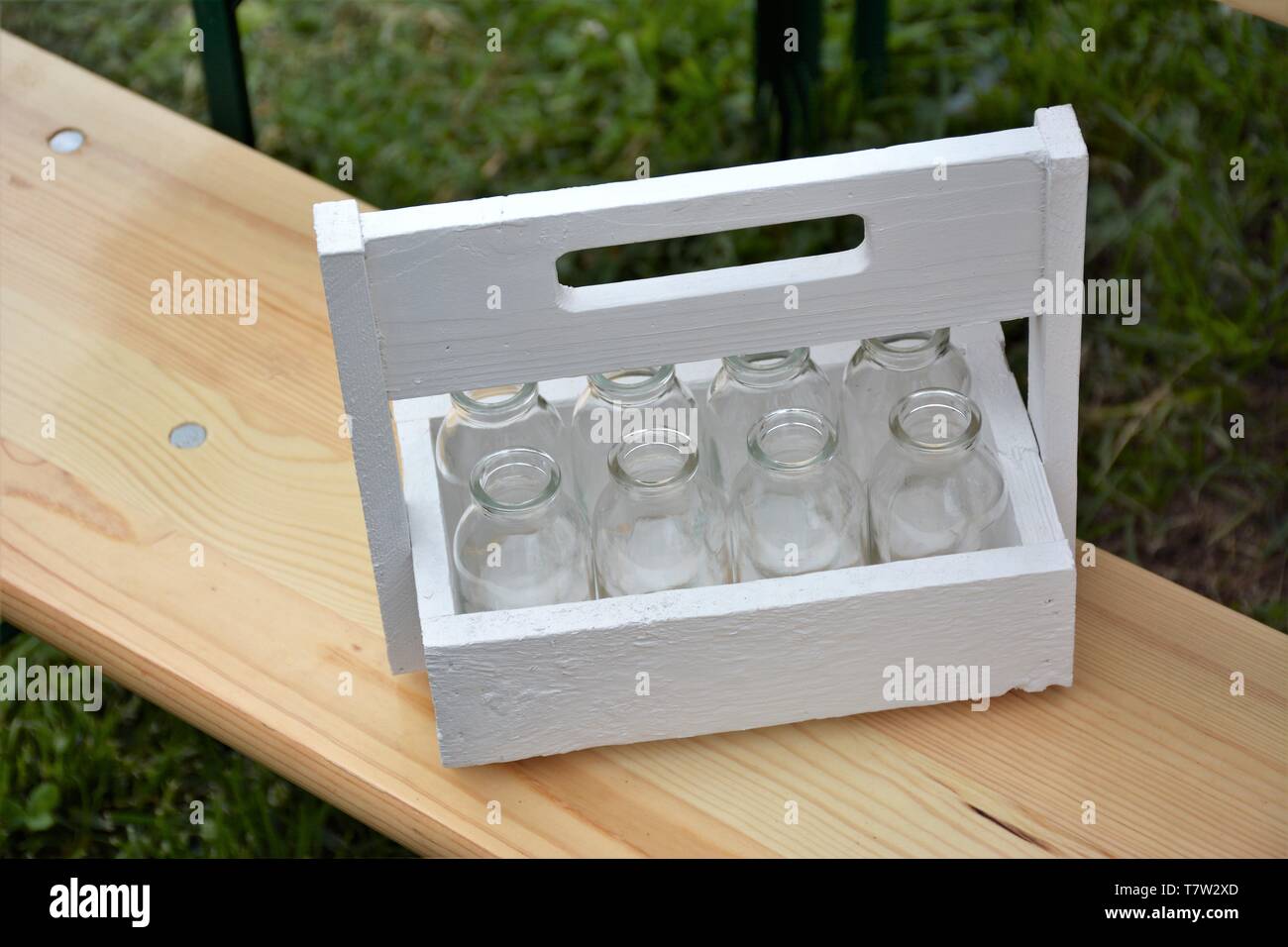 Small milk bottles for displaying Stock Photo - Alamy