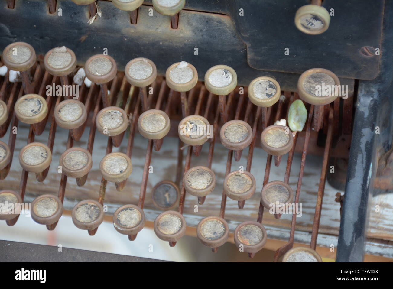 Older typewriter with rusted keys and falling apart Stock Photo - Alamy