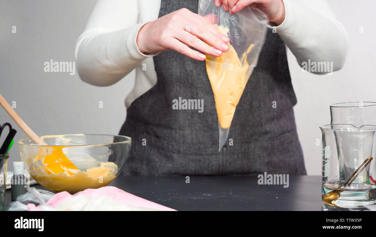 Step by step. Pouring royal icing into the piping bag to decorate sugar ...