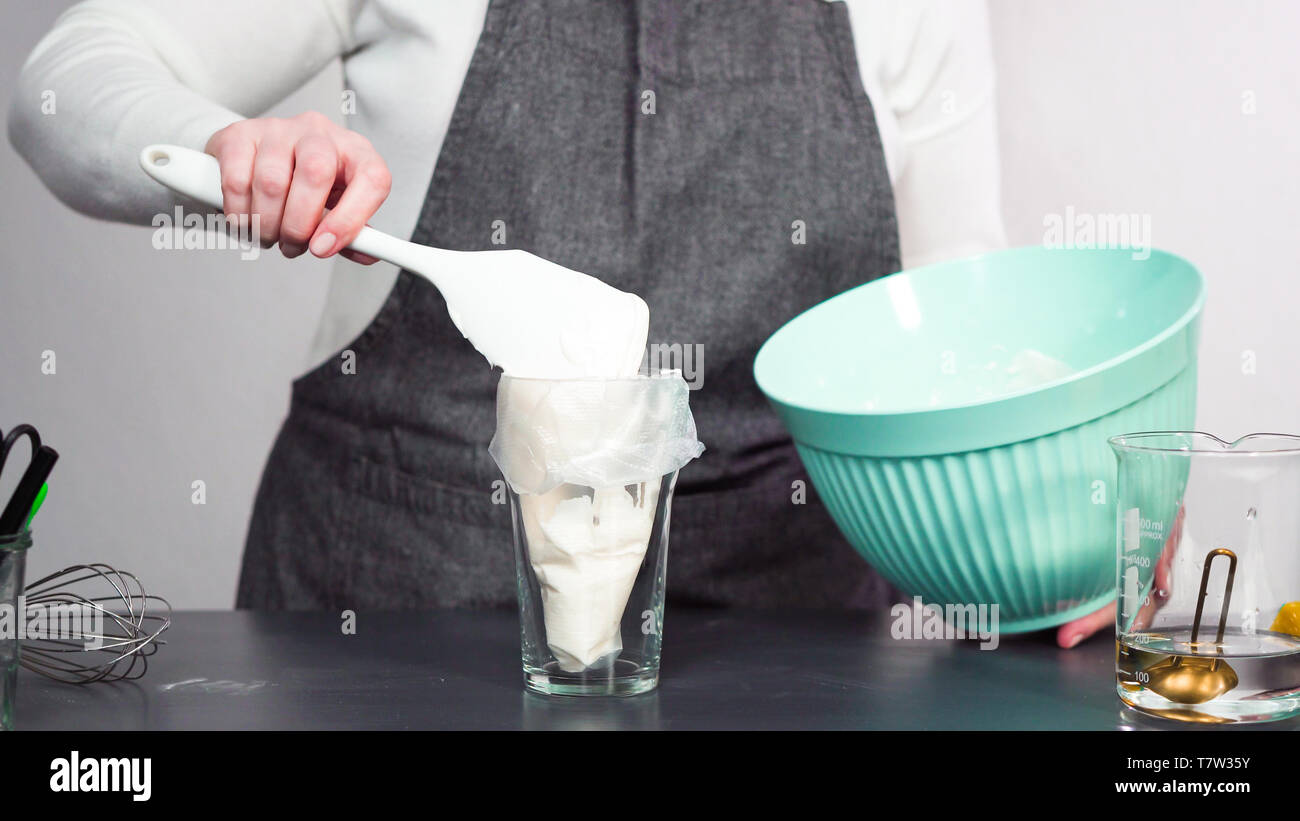 Step by step. Pouring royal icing into the piping bag to decorate sugar ...