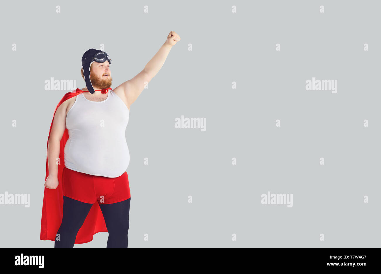 Funny fat man raised hi-res stock photography and images - Alamy