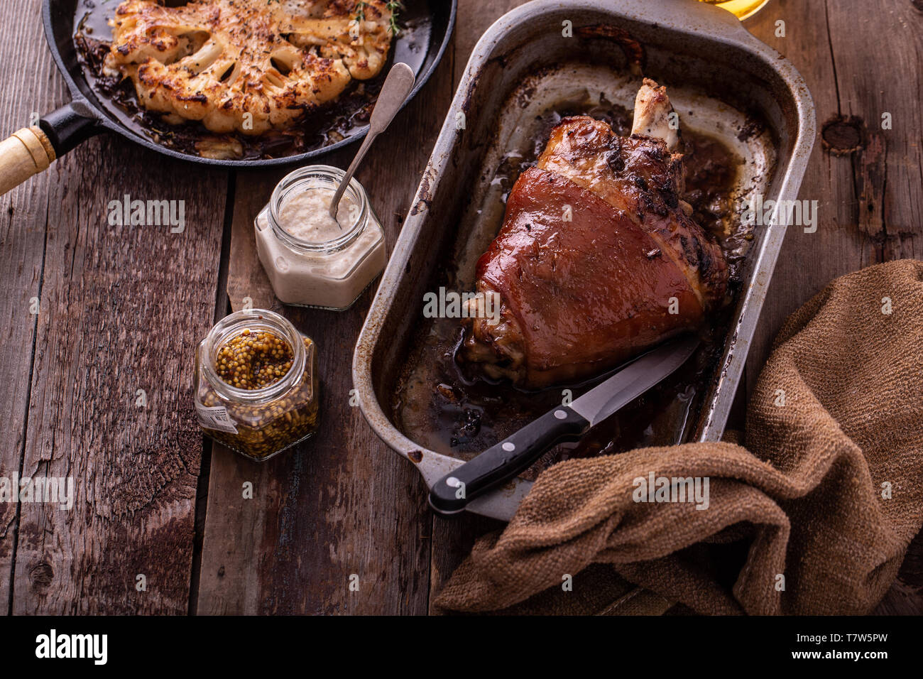 Honey glazed pork knuckle with beer. copy space Stock Photo - Alamy