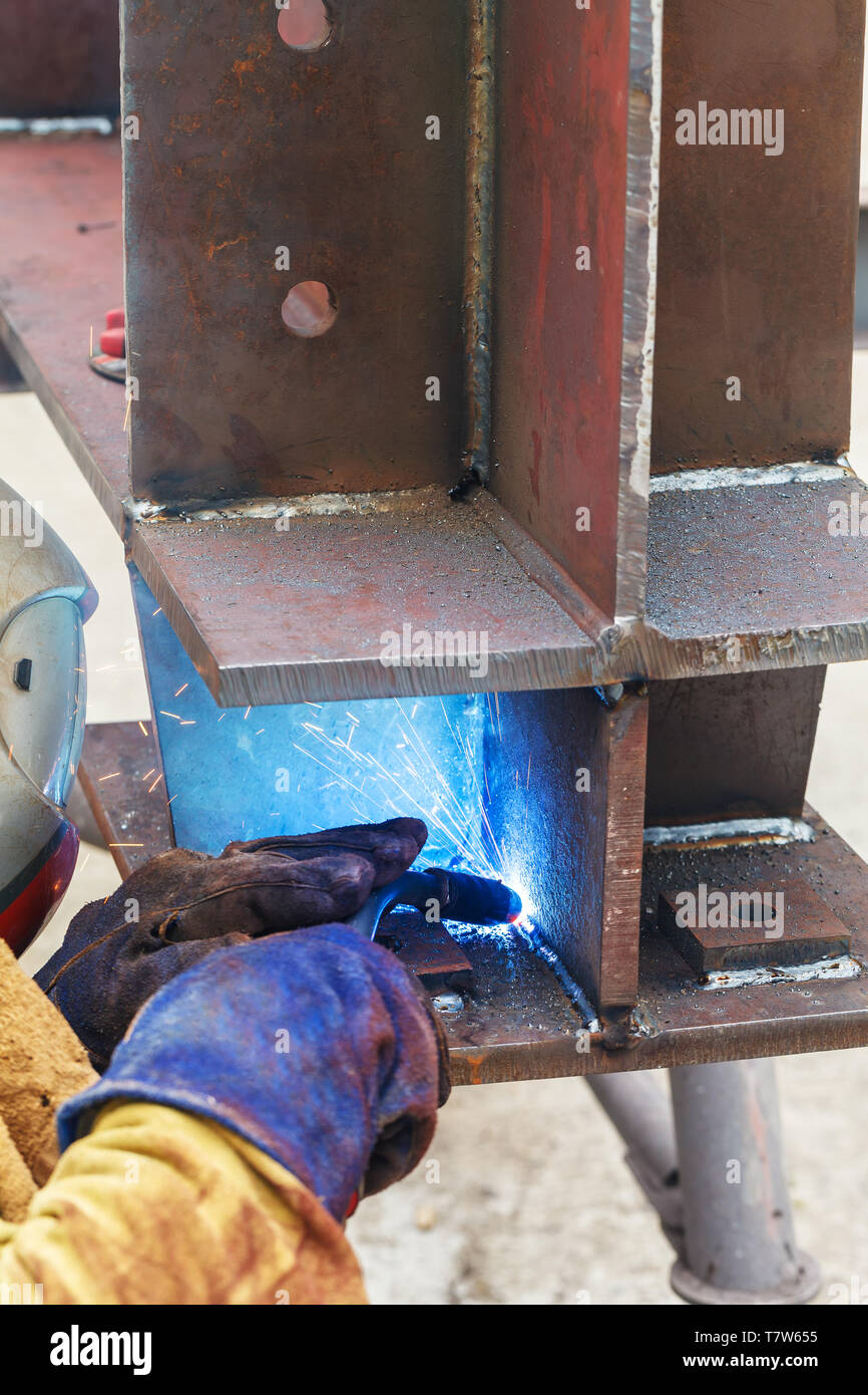 Welding work, welder welding metal material in heavy industry ...
