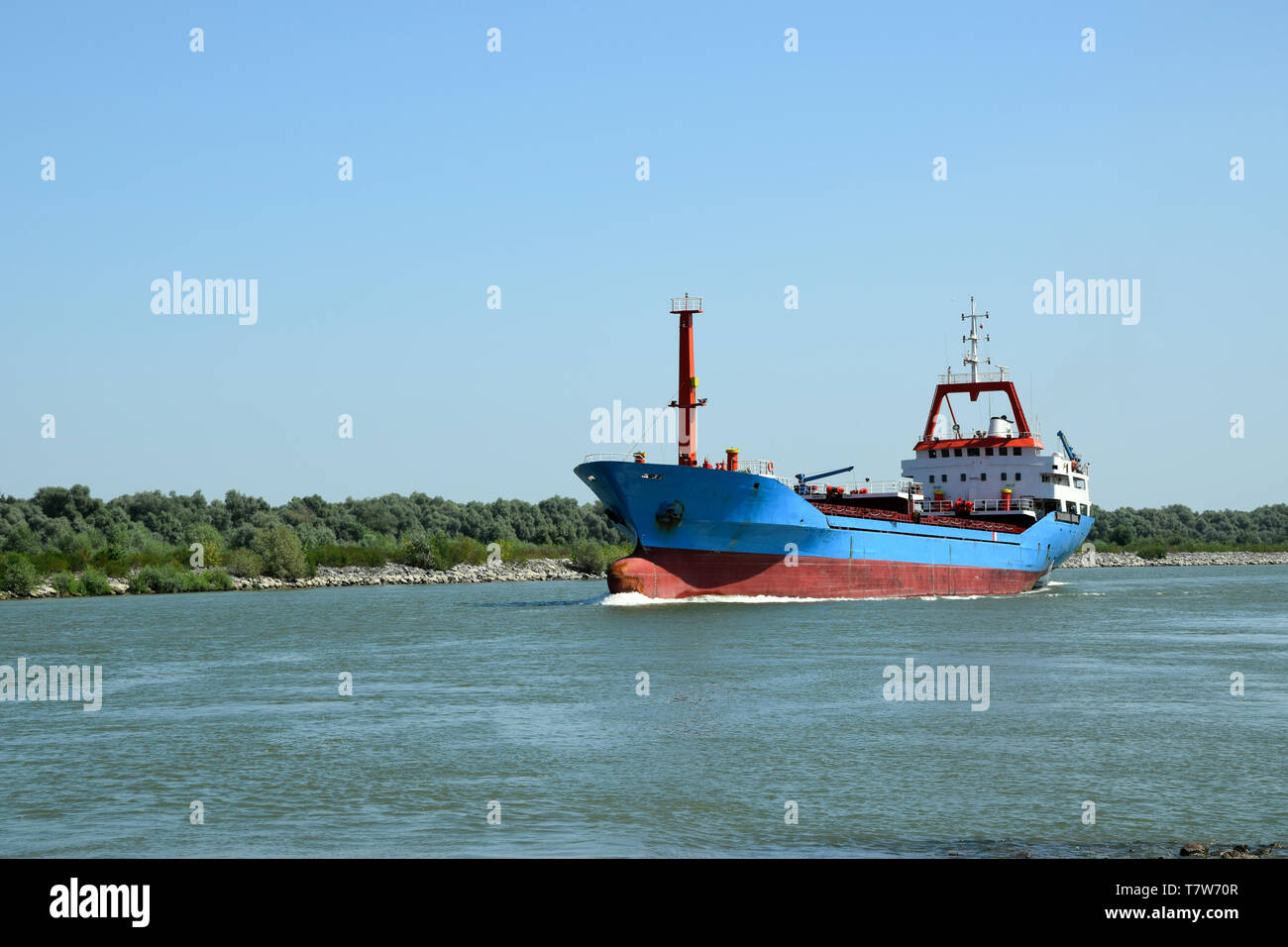 Cargo ship (bulk carrier) floats on the Danube river. Sulina, Danube ...
