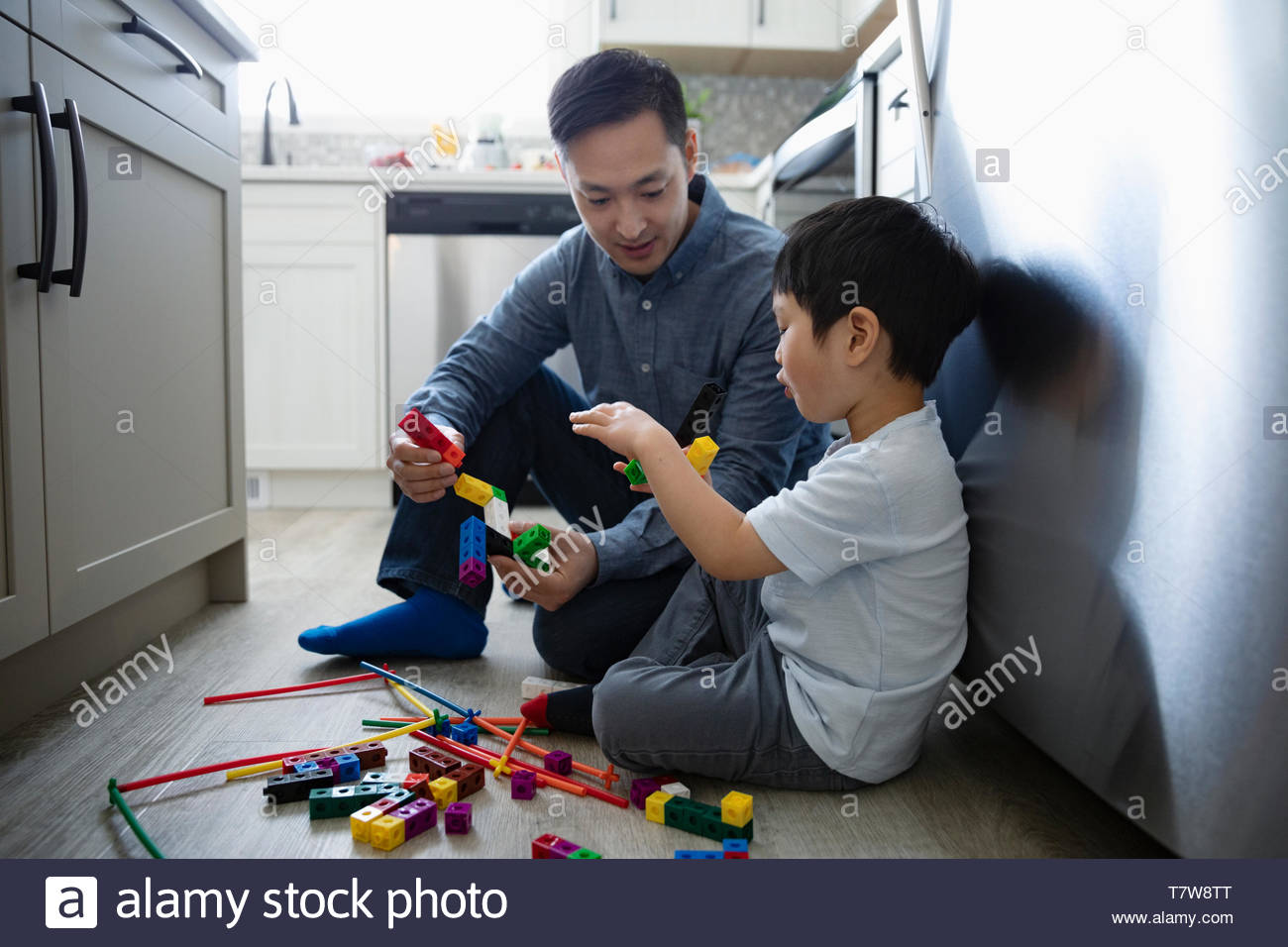 Father son block toy hi-res stock photography and images - Alamy