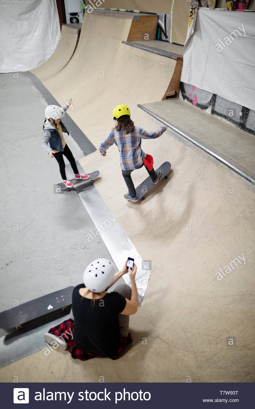 Filming their children hi-res stock photography and images - Alamy