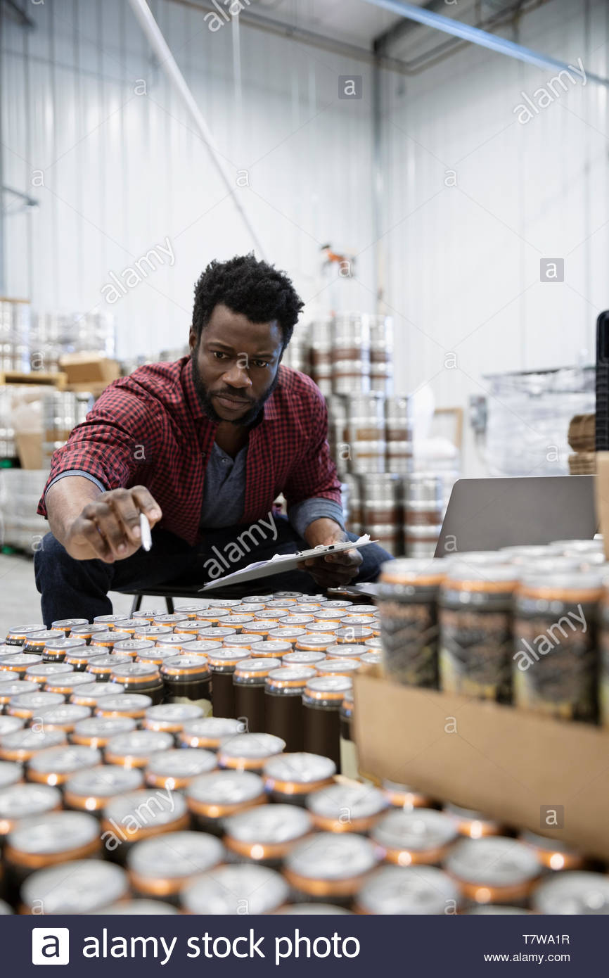 Man holding can beer real hi-res stock photography and images - Alamy