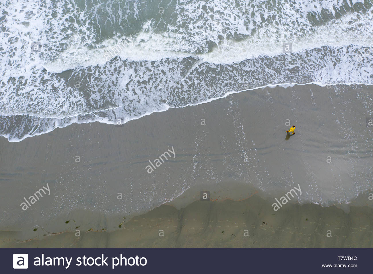 Wet sand on beach sand hi-res stock photography and images - Alamy