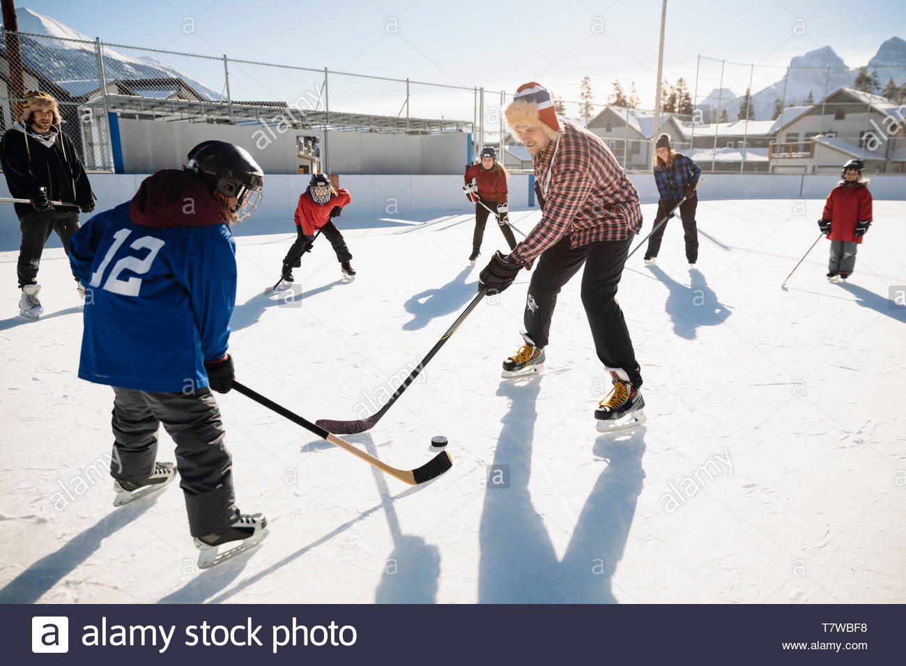 Group people standing community stick hi-res stock photography and ...