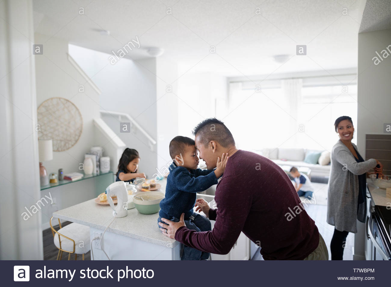 Family mother making breakfast children hi-res stock photography and ...