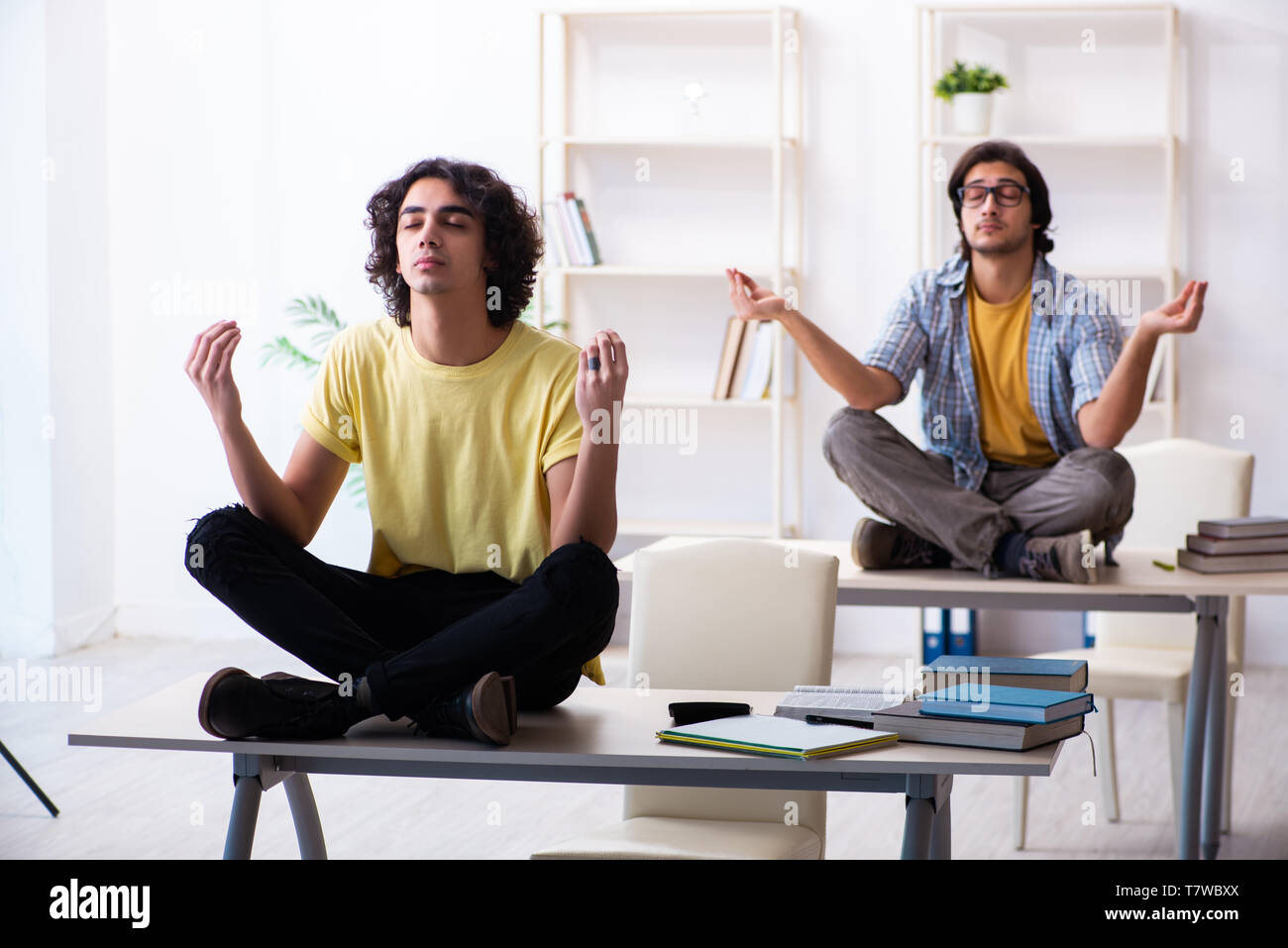 Two male students in the classroom Stock Photo - Alamy