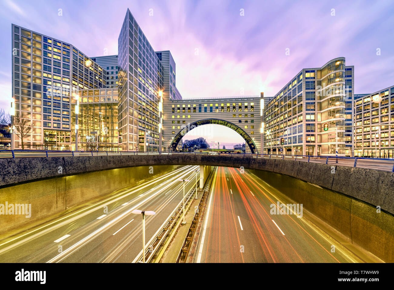Buildings over the end of A12 highway entering inside The Hague city ...