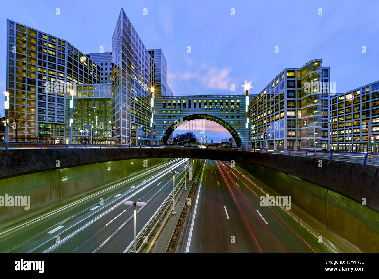 Buildings over the end of A12 highway entering inside The Hague city ...