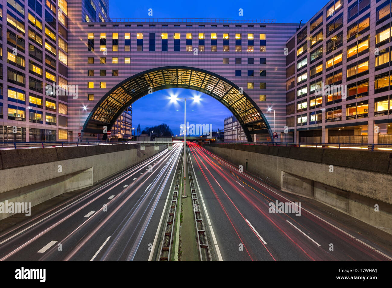 Buildings over the end of A12 highway entering inside The Hague city ...