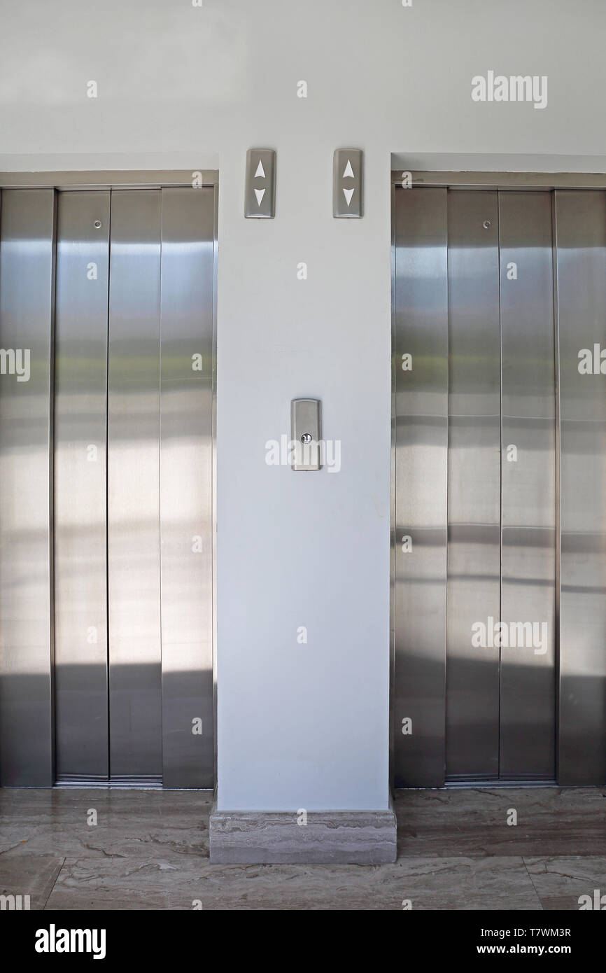 Two elevator doors hi-res stock photography and images - Alamy