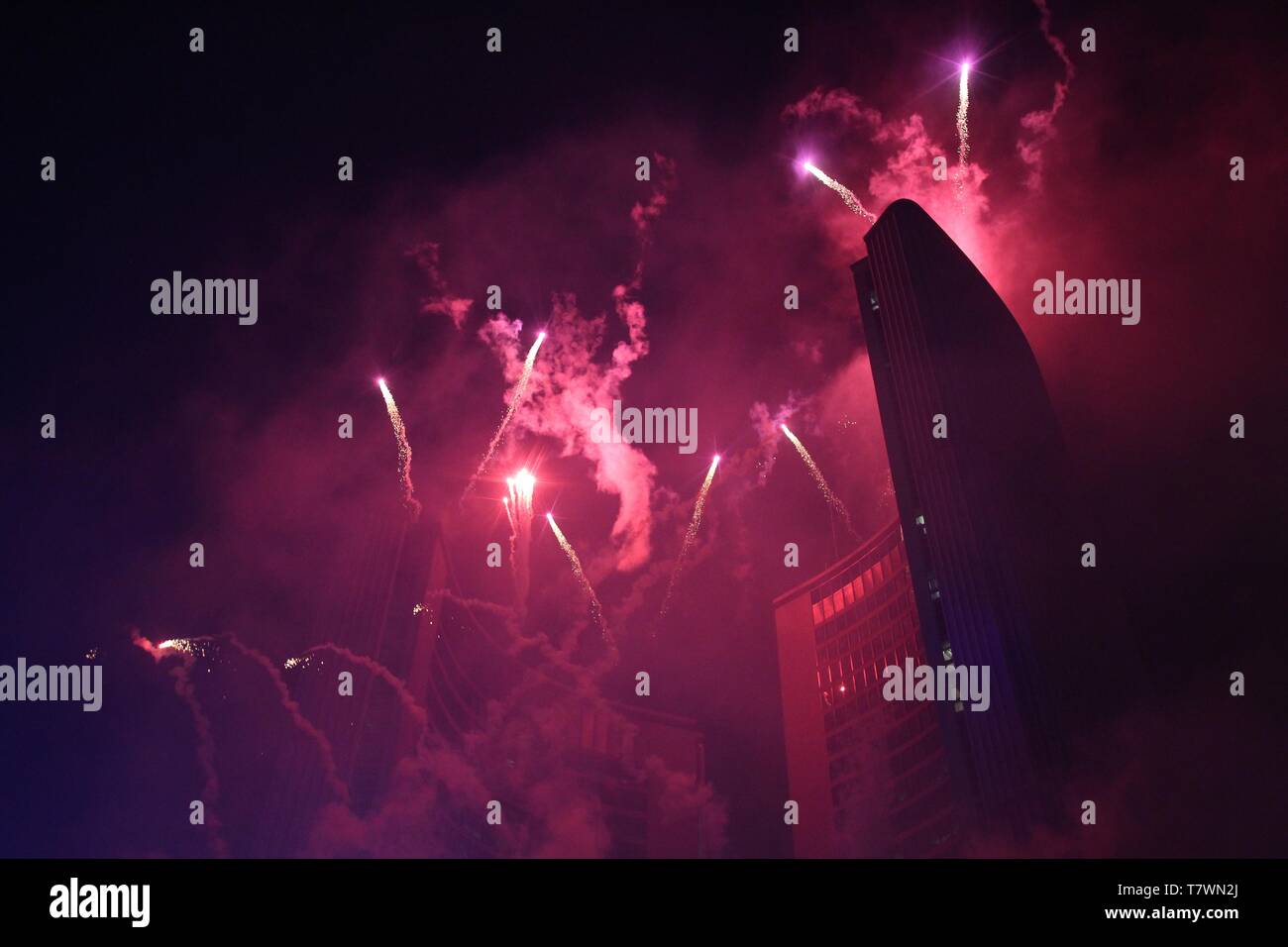 Red smoke bombs at a party Stock Photo - Alamy
