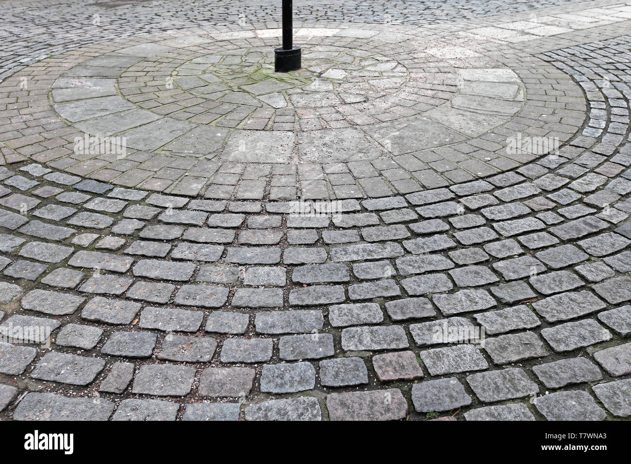 Round Cobblestones Circle Pavement at Town Square Stock Photo - Alamy