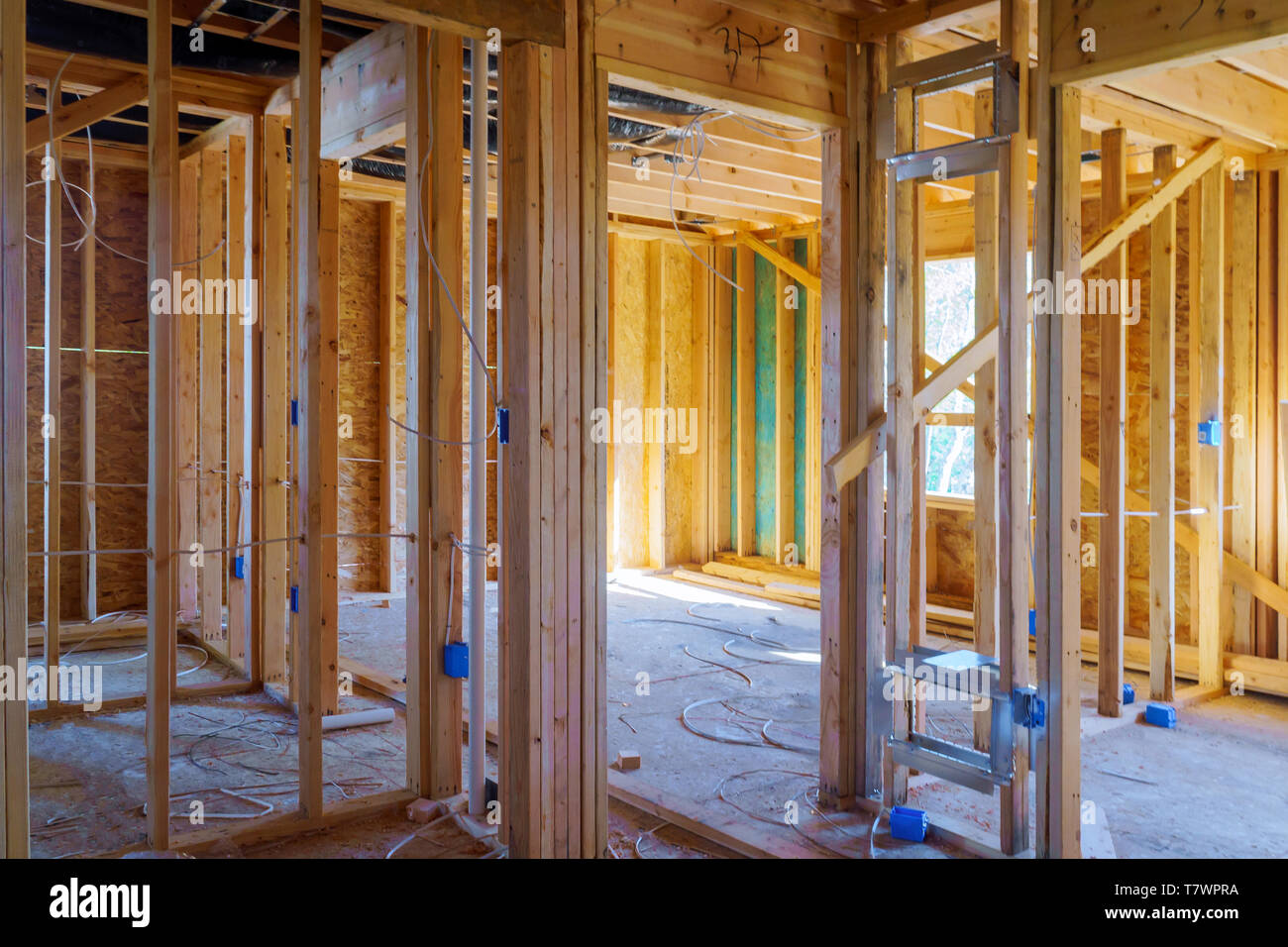 Home Framing unfinished wood frame building or a house Stock Photo - Alamy